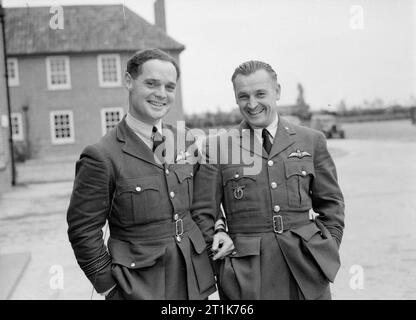 Squadron Leader Douglas Bader, CO of No. 242 Squadron, seated on his ...
