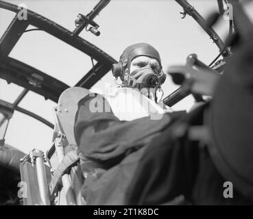 The pilot of an Avro Lancaster of No. 103 Squadron RAF based at Elsham ...
