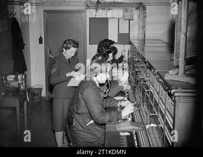 WAAF telephone operators at work at No. 11 Group HQ at Uxbridge in ...