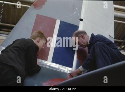 Ernest Oldham instructs Albert Austin on setting the tailplane of a ...