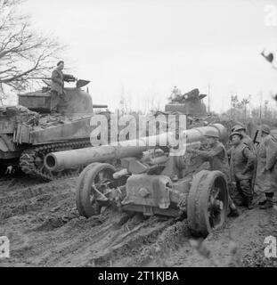 Sherman tanks of 46th Royal Tank Regiment provide fire support for the ...
