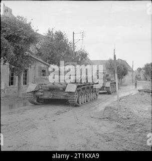 A captured German PzKpfw IV tank at 27th Armoured Brigade workshops ...