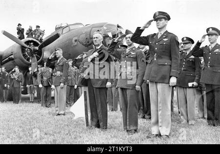 Staff Sergeant Maynard Smith of the 306th Bomb Group, is presented with ...