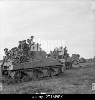 Infantry of 51st Highland Division are carried into battle aboard ...
