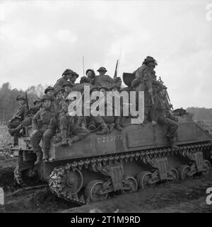 Infantry of 51st Highland Division are carried into battle aboard ...