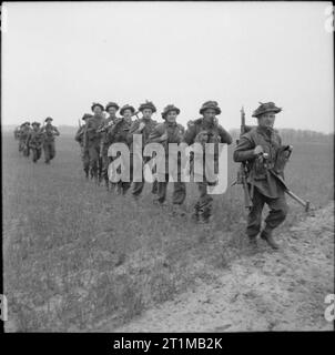 FILE -- In this April 16, 1945 black and white file photo, inmates of ...