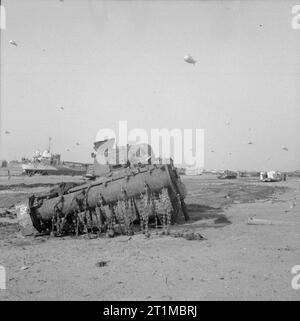 A Sherman Crab flail tank of the Westminster Dragoons advances through ...