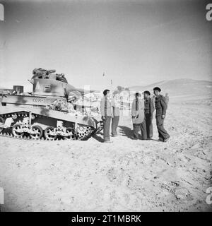 Stuart tanks and their crews of the British Army are lined up for ...