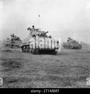 Sherman tanks of the 9th Armoured Brigade parade at Hadera, Palestine ...