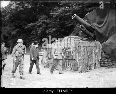 Winston Churchill inspecting a heavy artillery weapon known as the ...