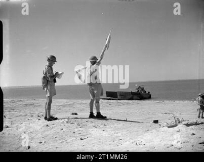 Royal Navy beach parties and commandos training with landing craft at ...