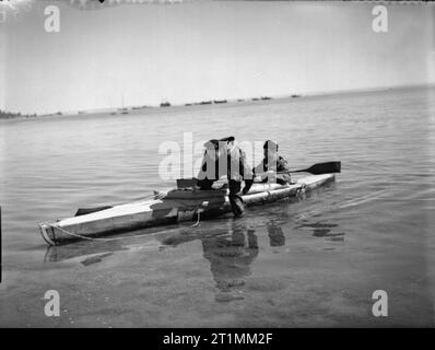 Royal Navy beach parties and commandos training with landing craft at ...