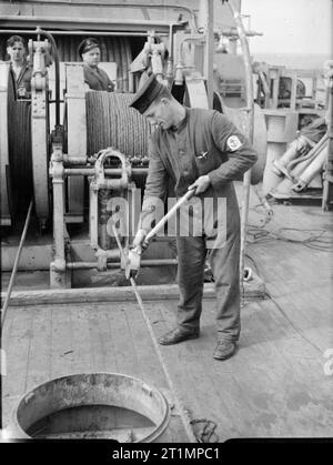 British Algerine class minesweeper HMS Acute Stock Photo - Alamy