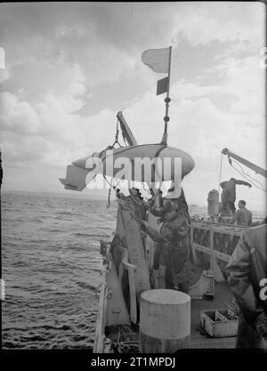 British Algerine class minesweeper HMS Acute Stock Photo - Alamy