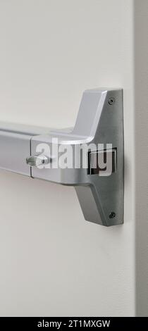 Emergency exit door. Closed up latch door handle of emergency exit ...