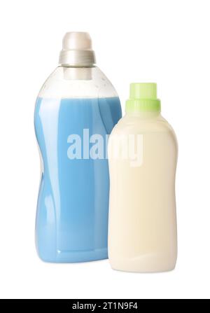 Two bottles of fabric softener blue and green colors, a stack of three ...