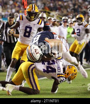 Auburn tight end Brandon Frazier (87) is tackled by Vanderbilt safety ...