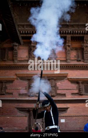 Kathmandu, Nepal. 15th Oct, 2023. Priests pray before sows barley seeds ...