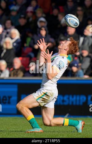 George Hendy #15 of Northampton Saints juggles a catch during the ...