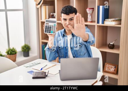 Non binary person calculating money savings serious face thinking about ...