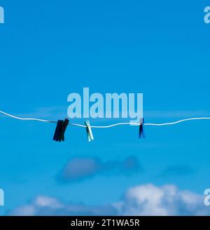 clothespeg washing line pegs plastic clothes drying Stock Photo - Alamy