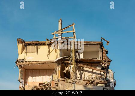 Destroyed residental building. Upper floors of destroyed house with ...