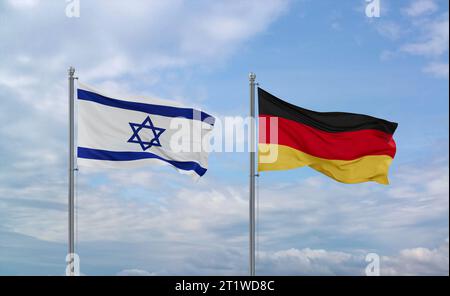 Israel and Germany flags waving together on blue cloudy sky, two ...