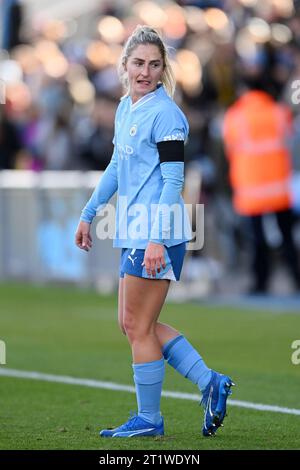 Laura Coombs of Manchester City Women jumps over Valery Vigilucci of ...