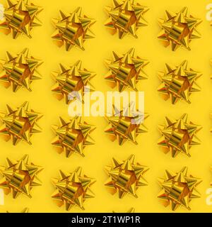 Flat lay of golden gift bows on dark background. New year and christmas ...