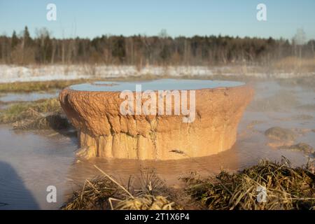 Rusty water pipe. Dumping waste into the river. Pollution of the ...