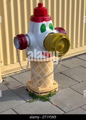 Street scene with decorated fire hydrant in the old medieval city of ...