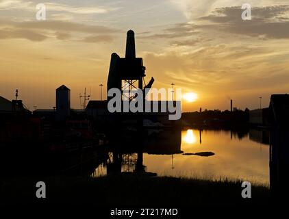 The Tom Pudding hoist, silhouetted against the sky, at the docks, Goole ...