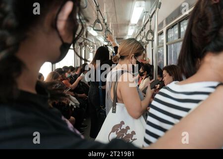 Manila, Philippines: Filipino commuters inside a cabin in a moving LRT ...