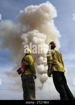 Smoke from controlled burns rises over rural farming community Stock ...