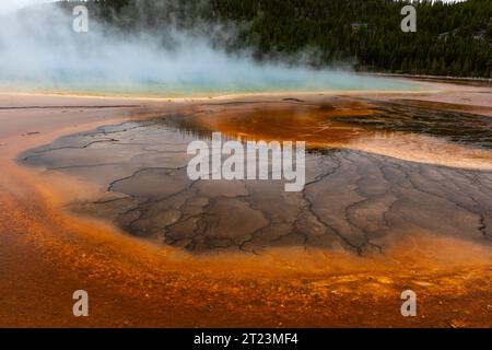 Deep orange and brown coolrs of mineral runoff from grand prismatic hot ...