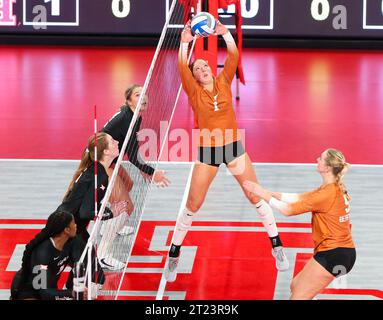 October 14, 2023: Texas setter Ella Swindle (1) sets the ball as ...