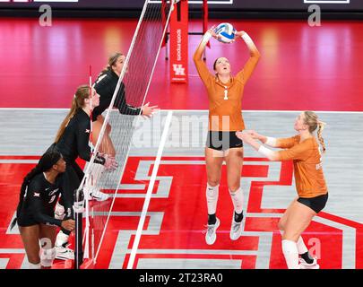 October 14, 2023: Texas setter Ella Swindle (1) sets the ball as ...