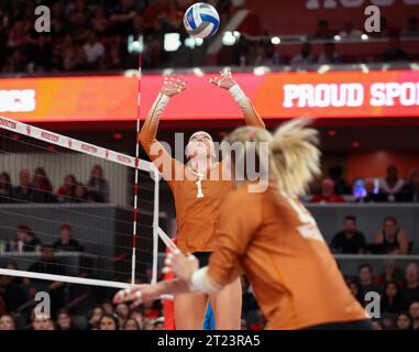 October 14, 2023: Texas setter Ella Swindle (1) sets the ball as ...