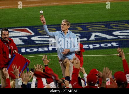 Philadelphia Phillies owner John Middleton, right, presents a Wall of ...