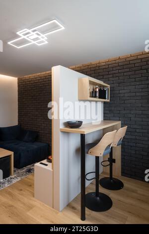 Compact bar counter or dining area in small urban apartment Stock Photo ...