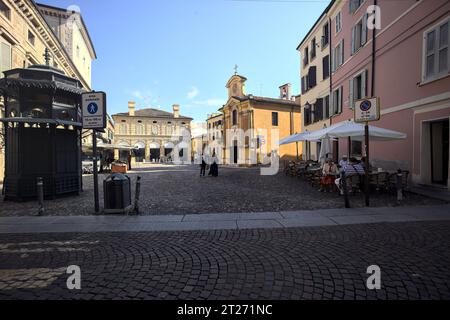 Mantova, Italy - September 2023 - Cobbled square with a small church ...