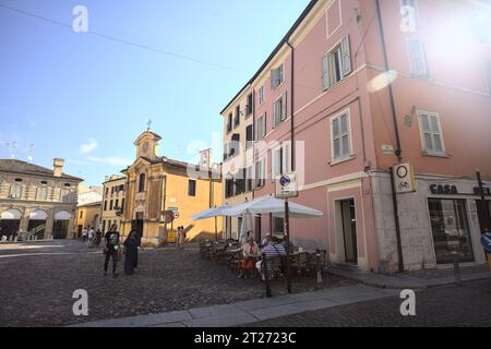 Mantova, Italy - September 2023 - Cobbled square with a small church ...