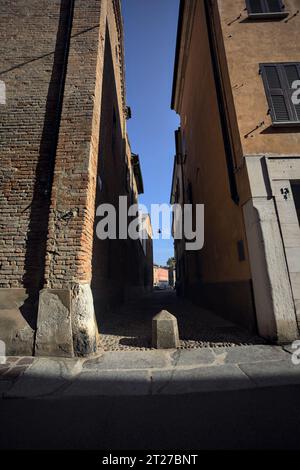 Corner of a street with a cobbled alley in an italian town Stock Photo ...