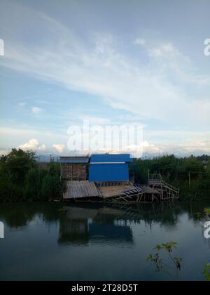 broken hut by the river Stock Photo - Alamy