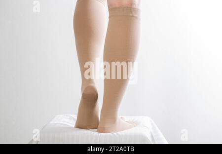 Female legs in compression stockings for varicose veins on the legs ...