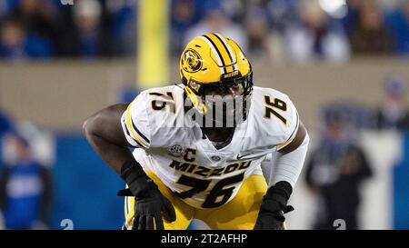 Missouri offensive lineman Javon Foster (76) sets up to block in front ...