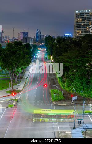 A night view of Singapore and Raffles Avenue at its intersection with ...