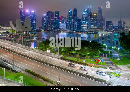 A night view of Singapore including the city skyline, the ArtScience ...