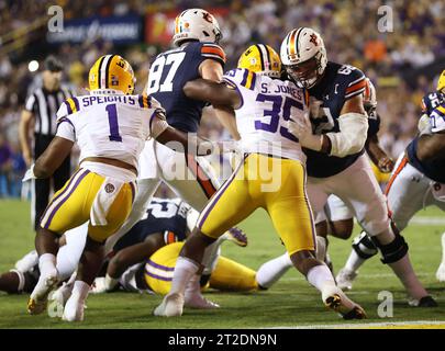 LSU defensive lineman Sai'vion Jones stretches at the NFL football ...