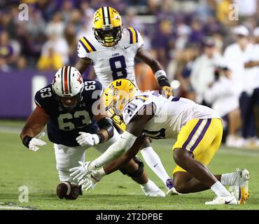 Both Auburn Tigers offensive lineman Jaden Muskrat (63) and LSU Tigers ...
